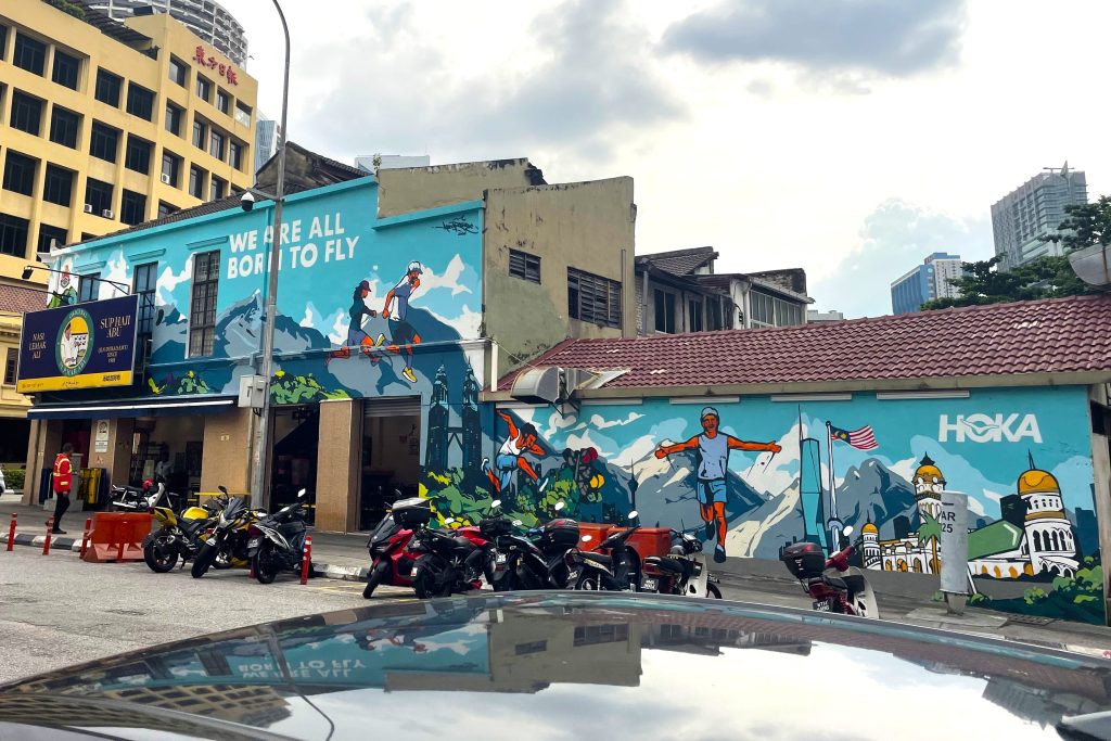 HOKA ‘We Are All Born to Fly’ Campaign Takes Shape in Stunning Mural ...